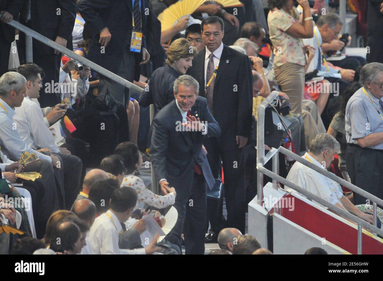 US President George Bush and wife Laura attend the opening ceremony of ...