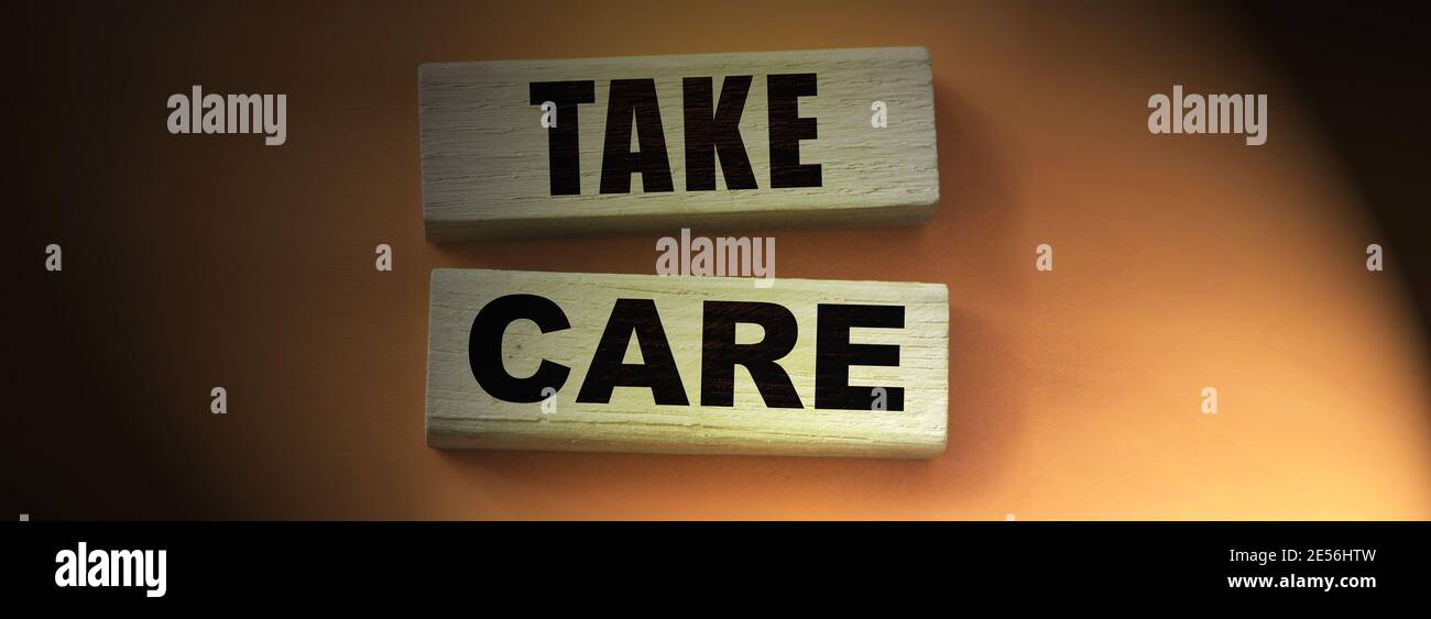words take care on wooden blocks. Self care and healthcare concept ...