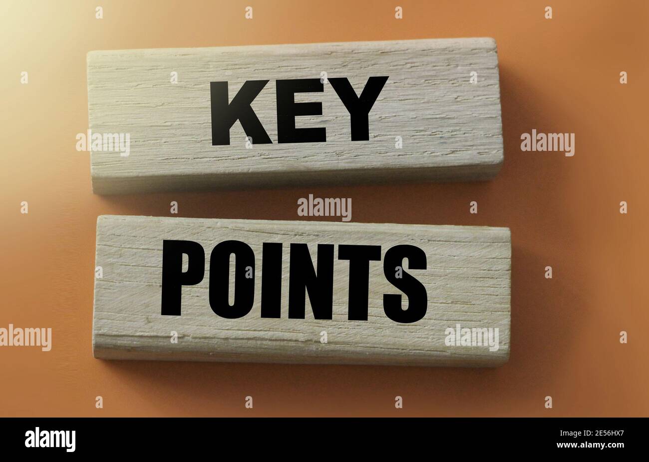 Key Points on cube wooden blocks on red background. Business success ...
