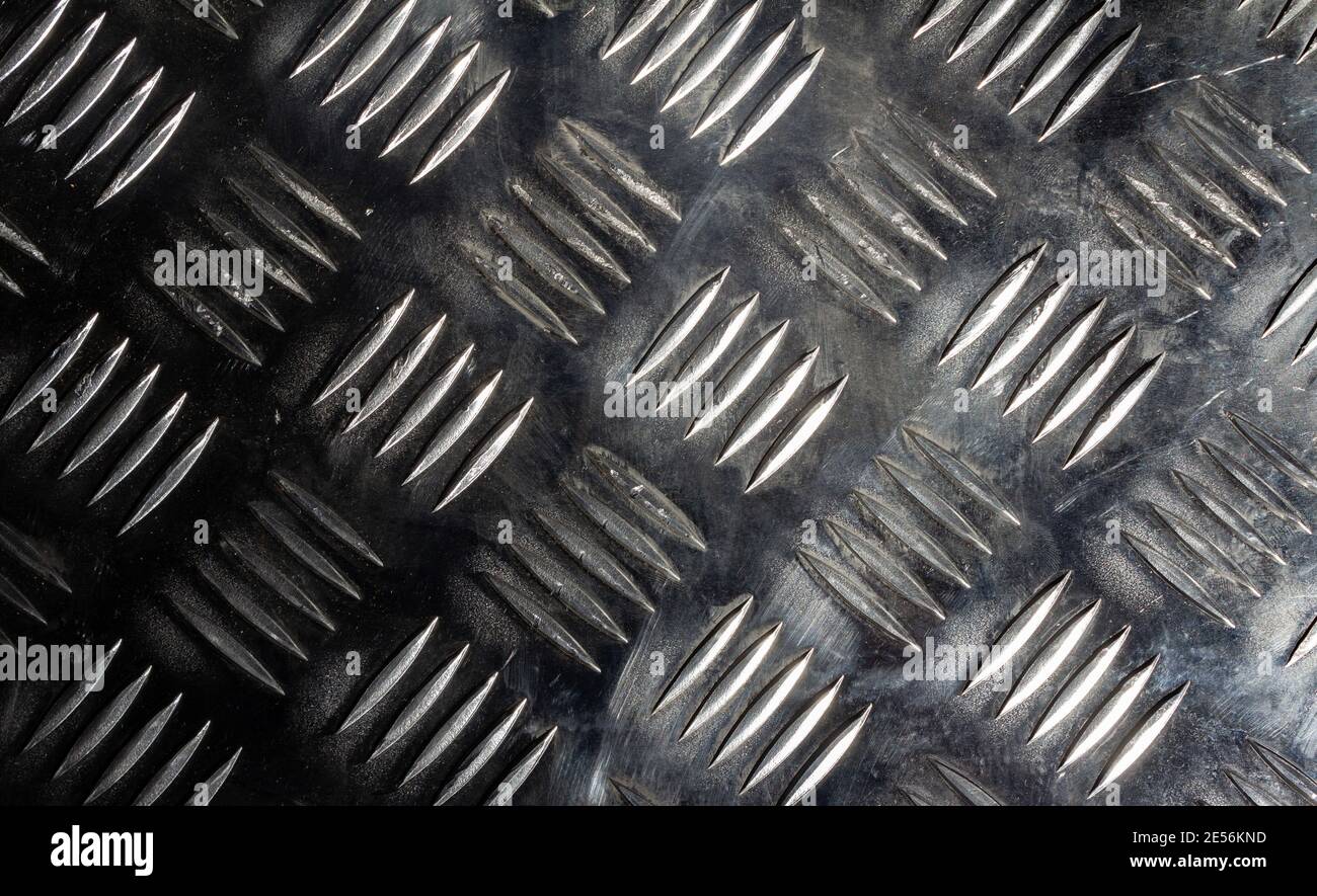 Used and scratched photo of diamond steel metal sheet Stock Photo - Alamy