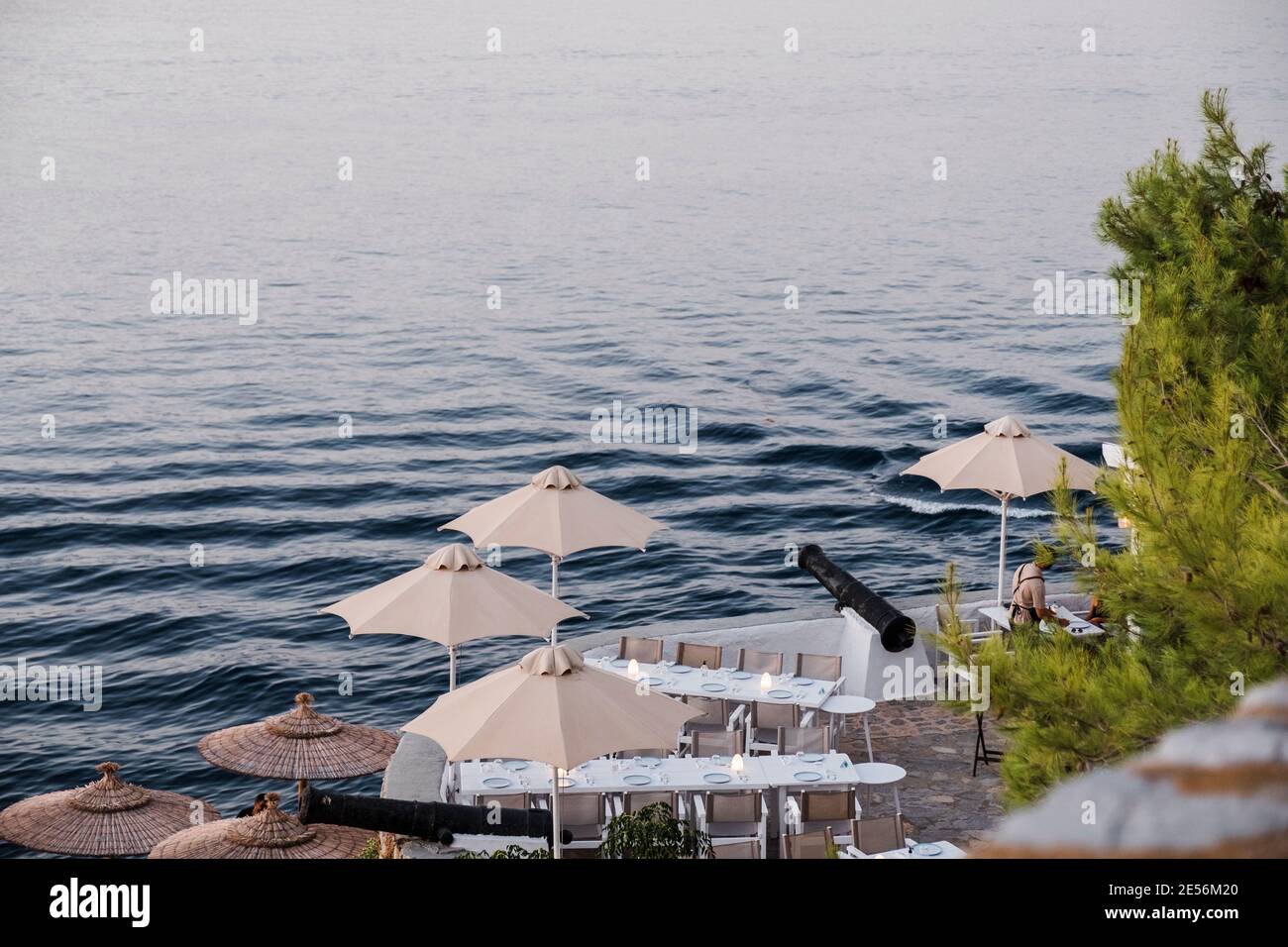 Dining tables at Sunset Restaurant Stock Photo - Alamy