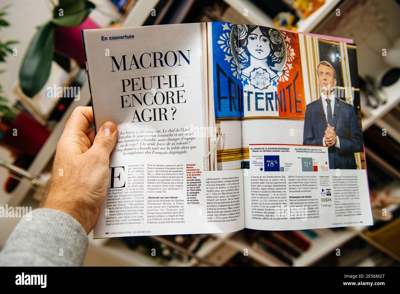 Hand holding macron hi-res stock photography and images - Alamy