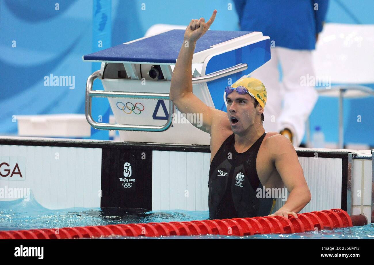 Australia's Eamon Sullivan celebrates after winning the men's 100m ...