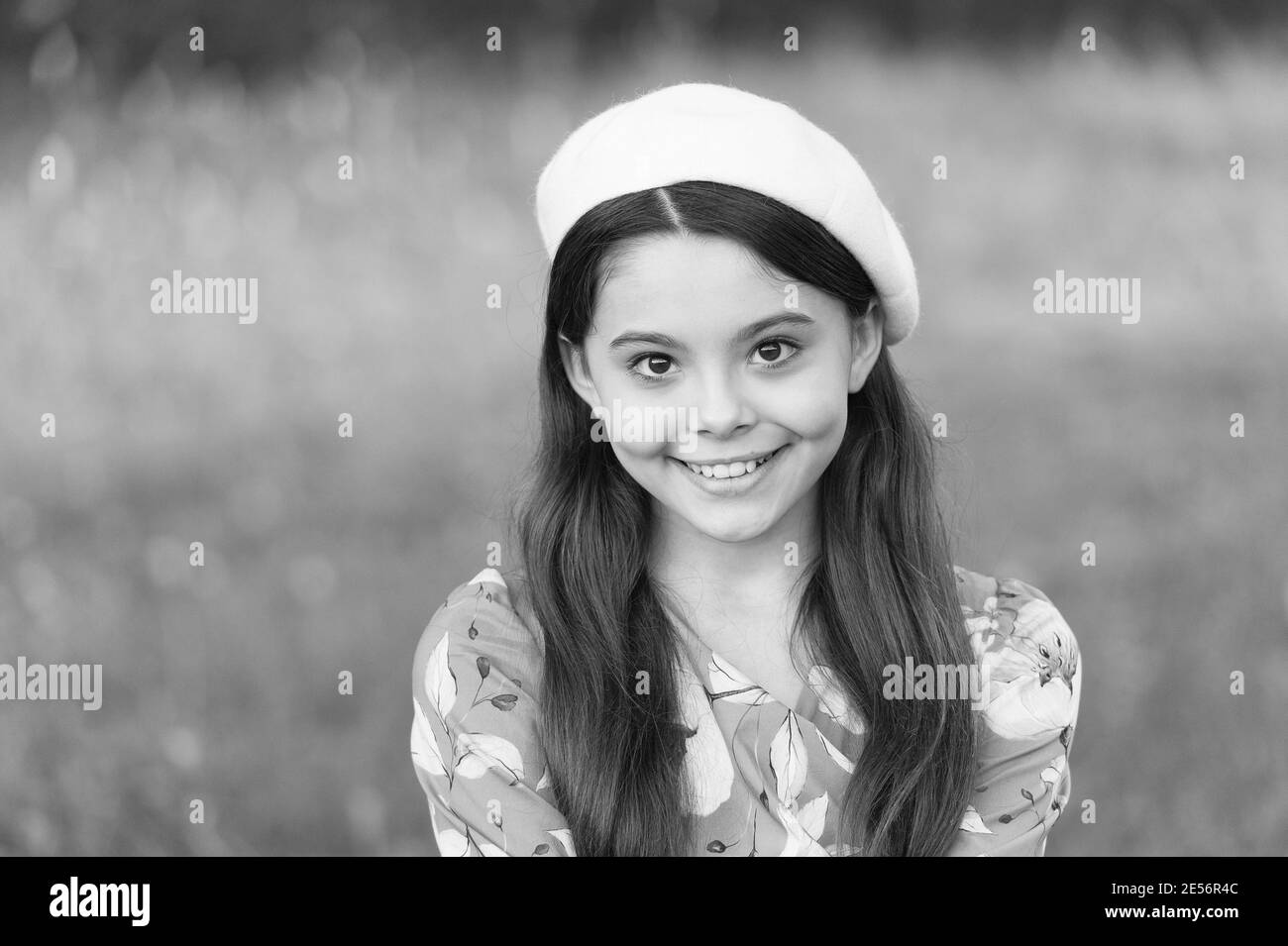 Grow up with smiling. Happy kid with cheerful smiling face outdoors ...