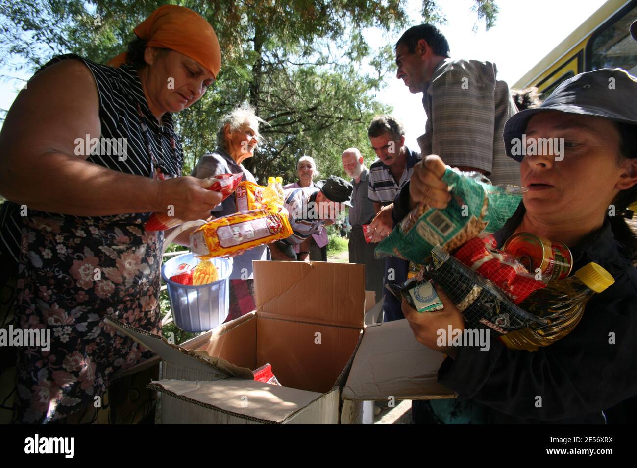 Georgian civilians receive some humanitarian aid from the International ...