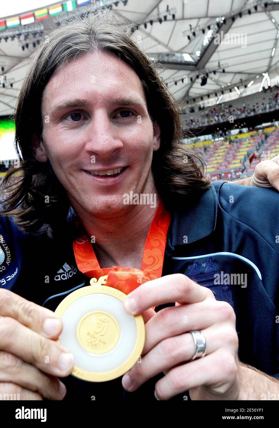 Argentina's Lionel Messi with his gold medal after the Men's Gold Medal ...