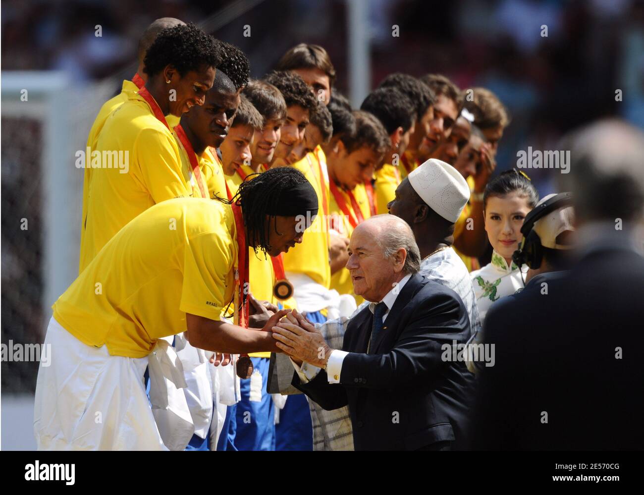 Ronaldinho of Brazil receives his bronze meda from Sepp Blatter, Fifa ...