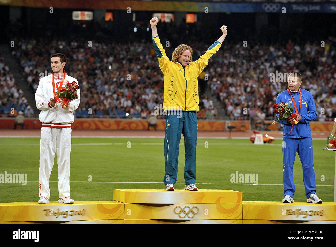 (L-R) Silver medalist Evgeny Lukyanenko of Russia, gold medalist Steve ...
