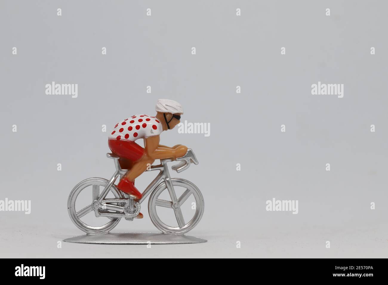 Miniature model cyclist racing Stock Photo - Alamy