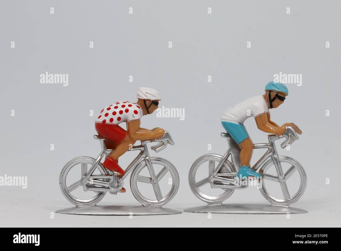 Miniature model cyclists racing Stock Photo - Alamy