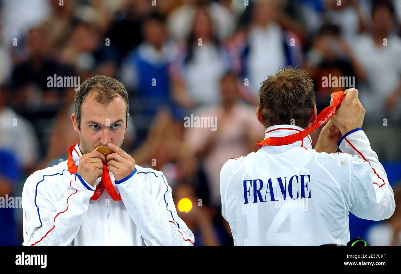 France's goalkeeper Omeyer Thierry celebrates with his gold medal after ...