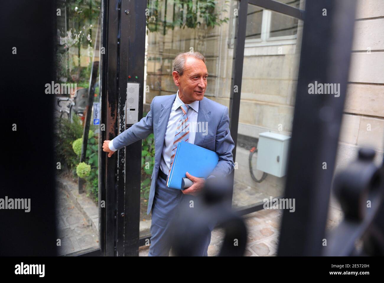 Bertrand Delanoe arrives at the Socialist Party's headquarters in Paris ...