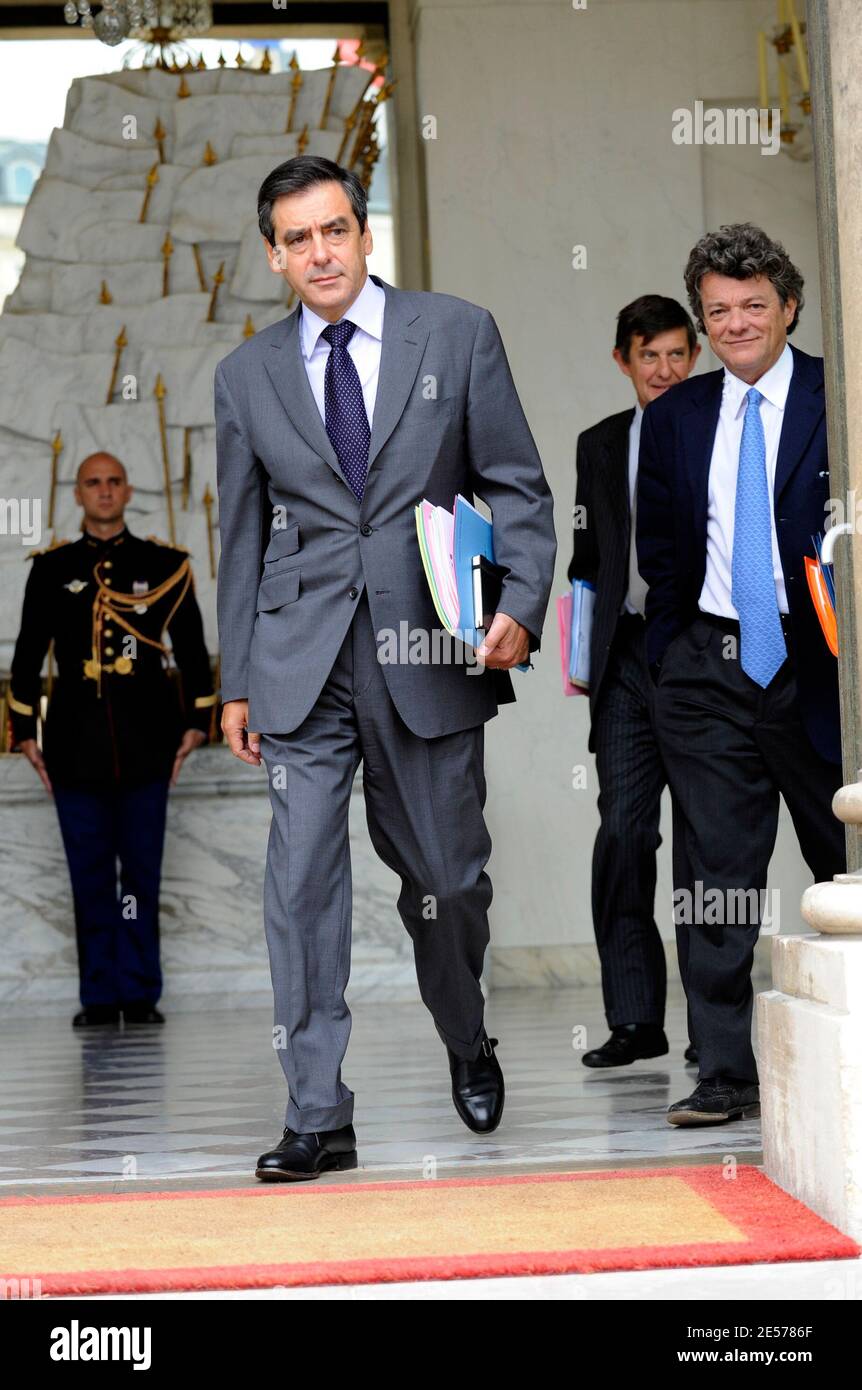 French prime minister Francois Fillon and Jean-Louis Borloo leave the ...