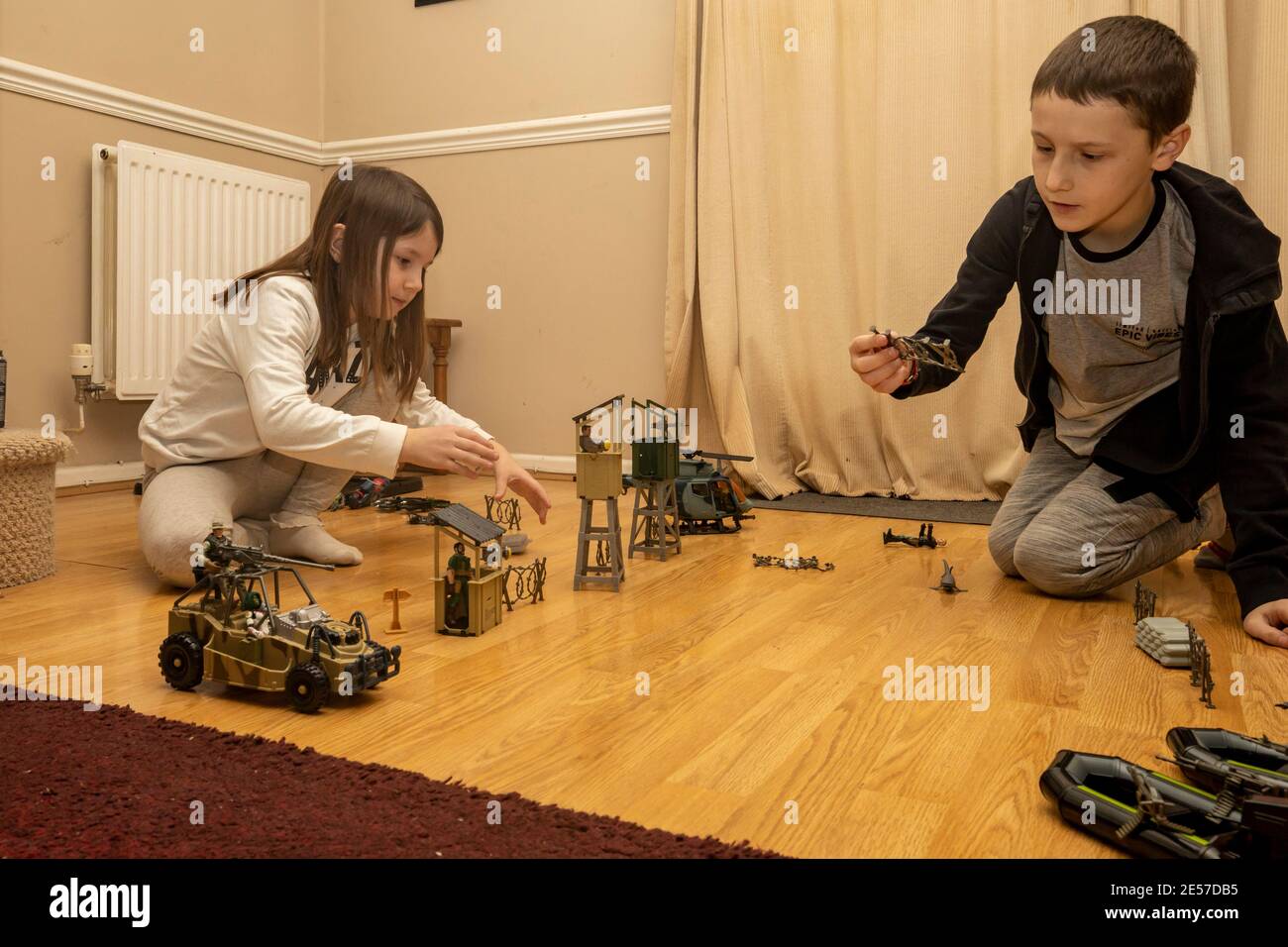 Children playing together indoors during Covid 19 Lockdown, UK Stock ...