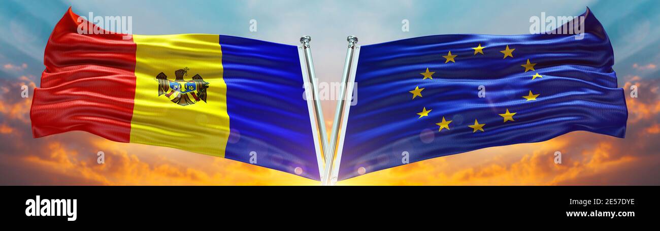 European Union Flag and Moldova flag waving with texture sky Cloud and ...