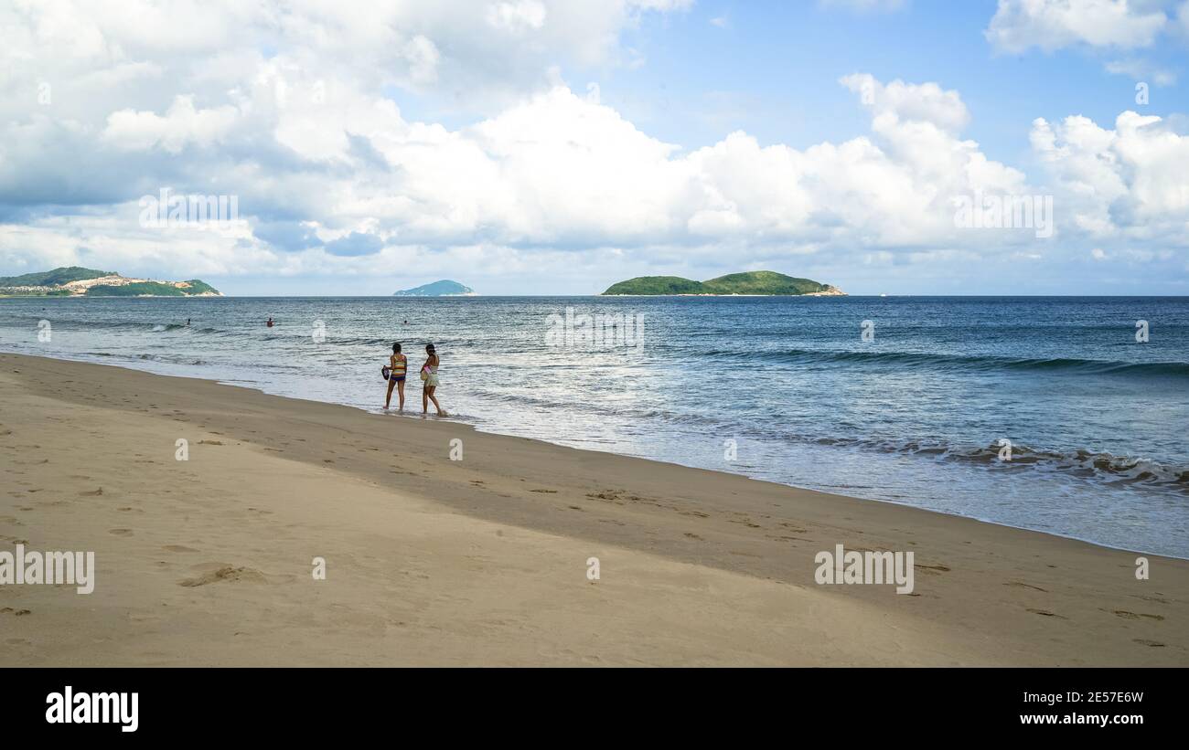 beach with white sand on Hainan Island, sunny weather, summer travel ...