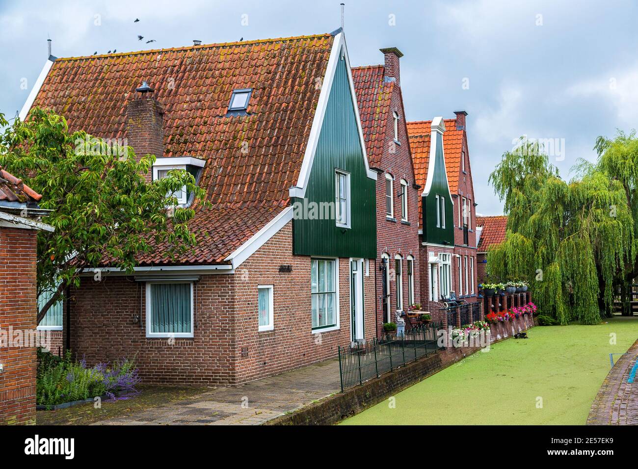 Traditional houses in Holland town Volendam, Netherlands in a summer ...