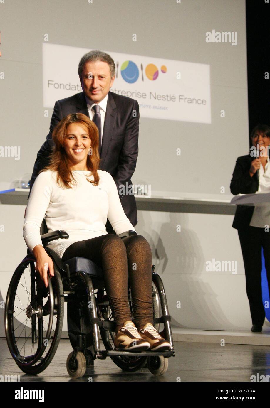 Sandra Laoura and Michel Drucker during the Nids d'Or for Nestle party ...