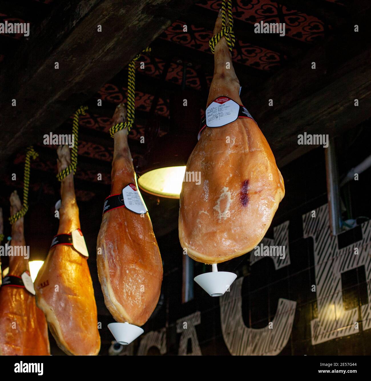Hams hanging from ceiling hi-res stock photography and images - Alamy