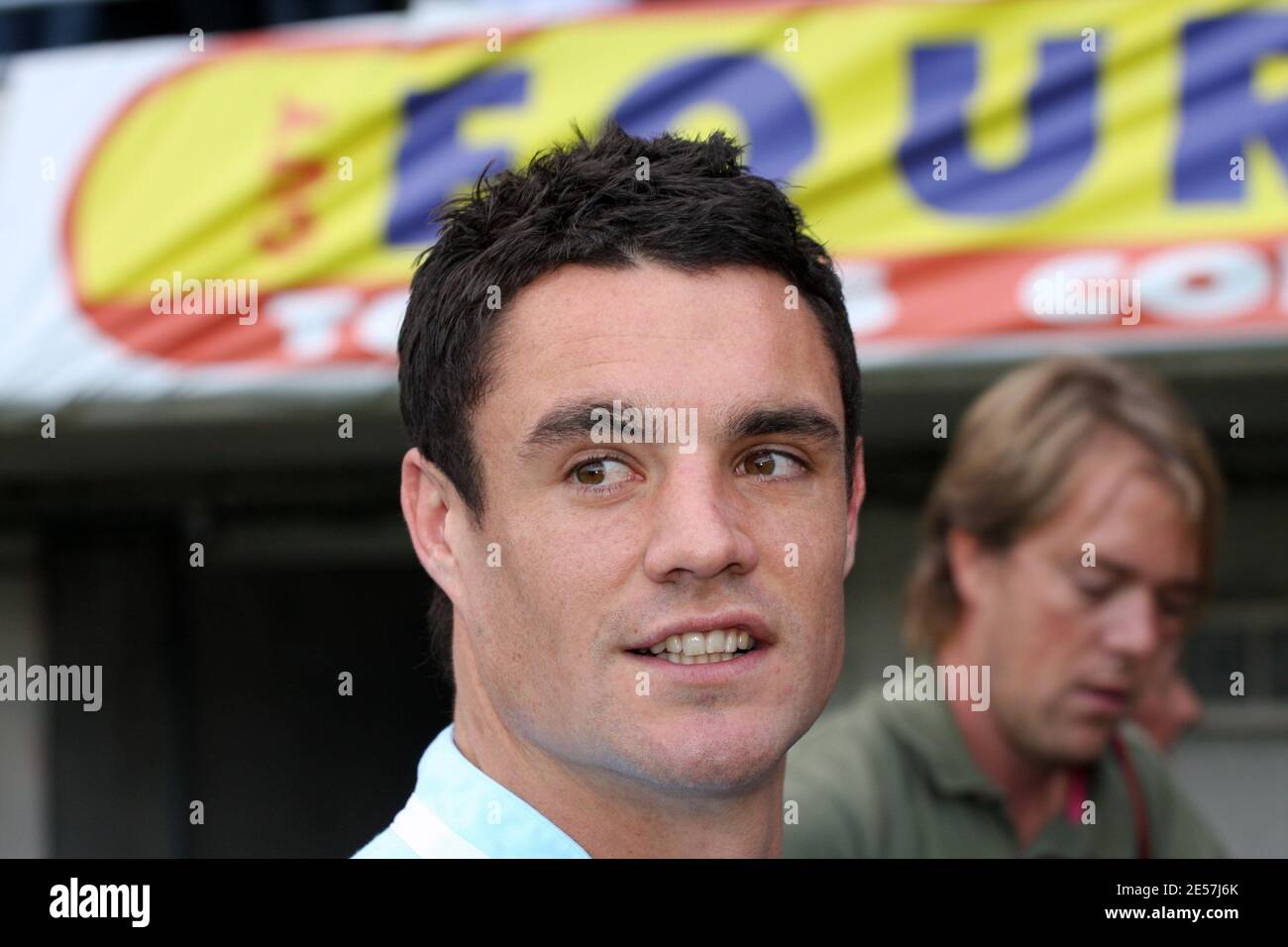 New Zealand's former All Black flyhalf Daniel Carter (C) arrives at the ...