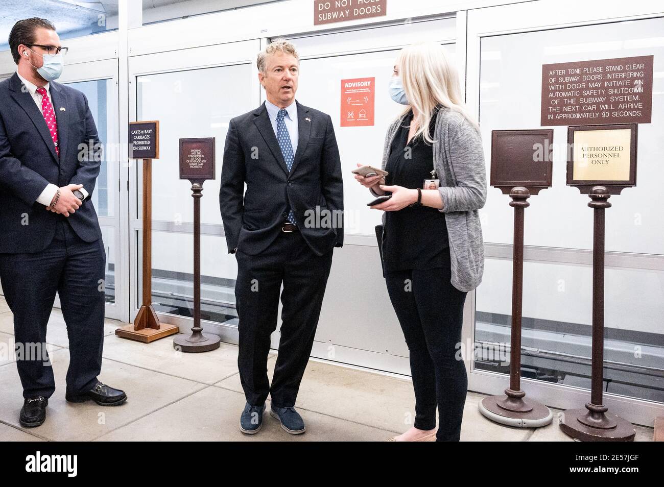 Senator Rand Paul (R-KY) talking with a reporter near the Senate Subway ...