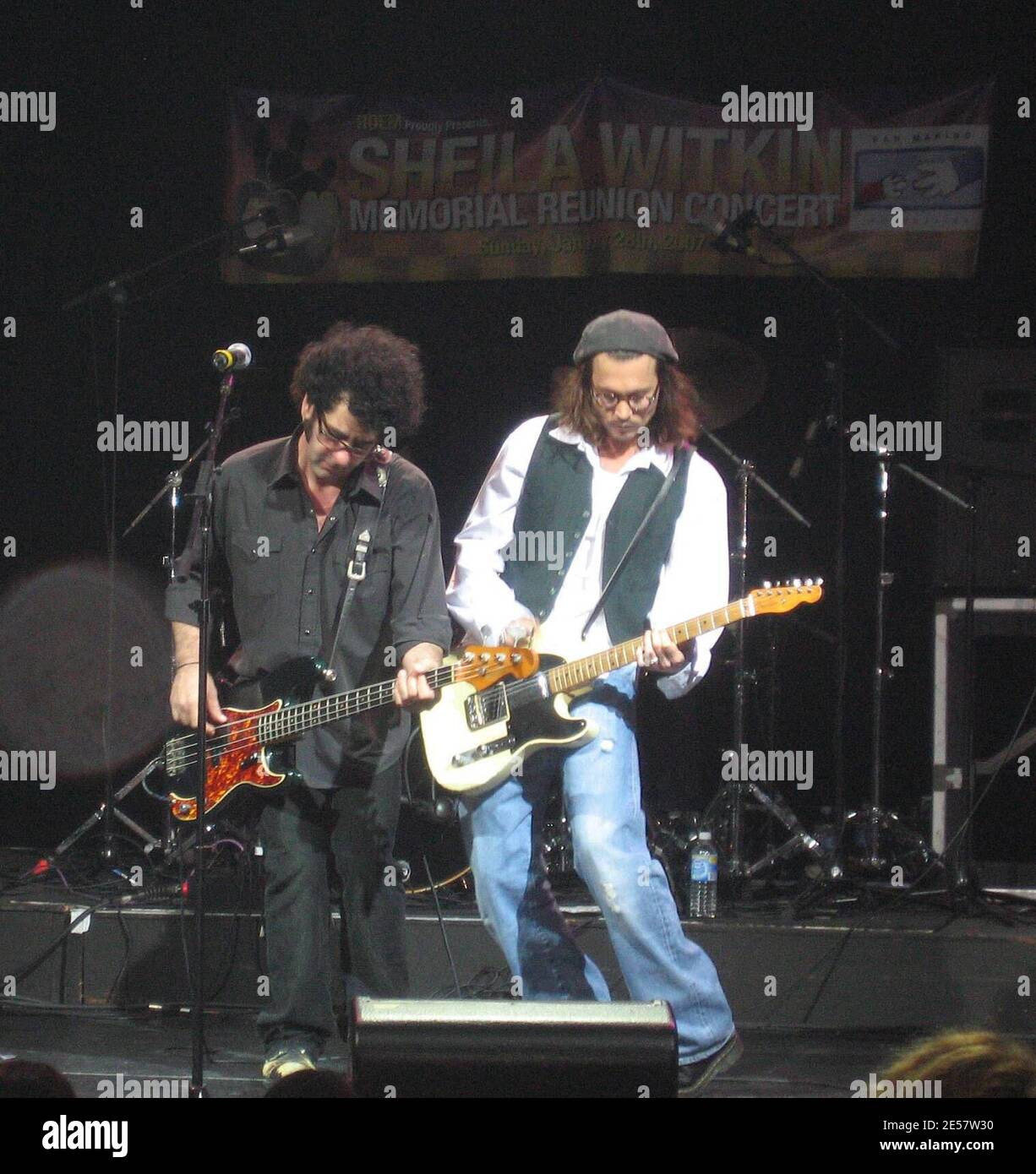 Heart throb actor Johnny Depp joined his old band 'The Kids" on stage ...