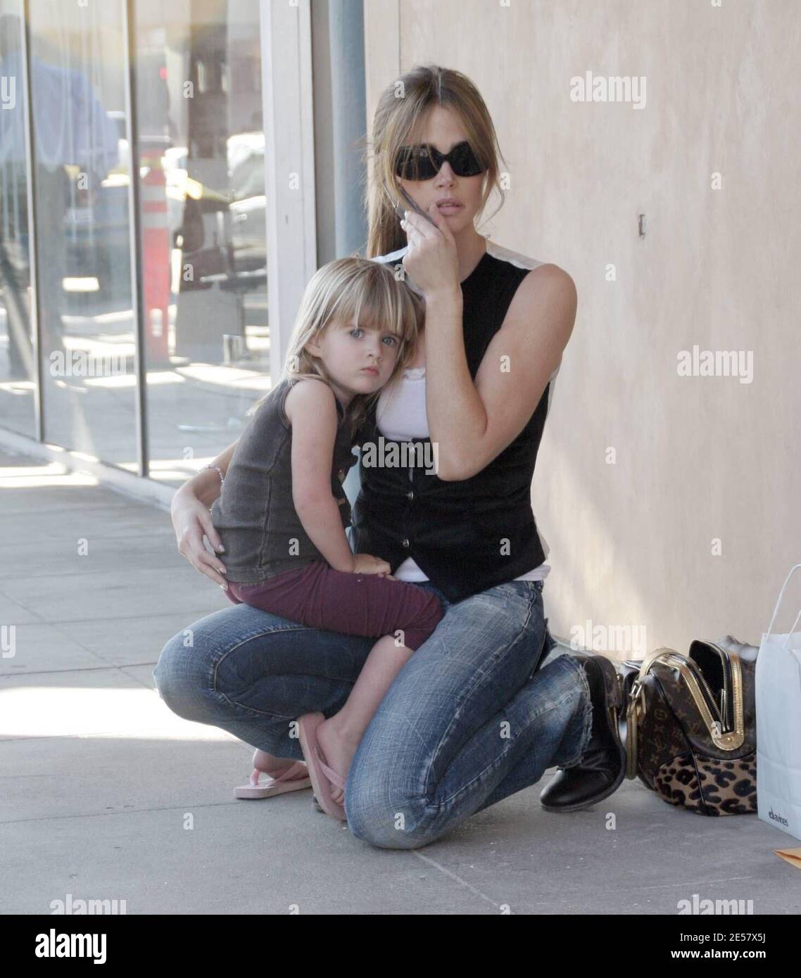 Denise richards and sam sheen hi-res stock photography and images - Alamy