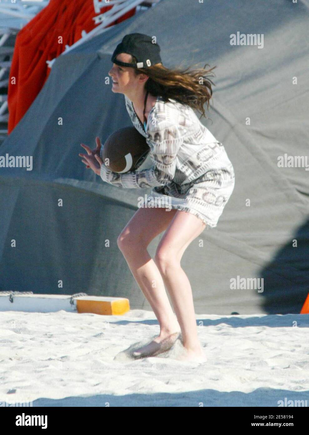 Dina, Ali & Dakota Lohan enjoy a game of football with friends over ...