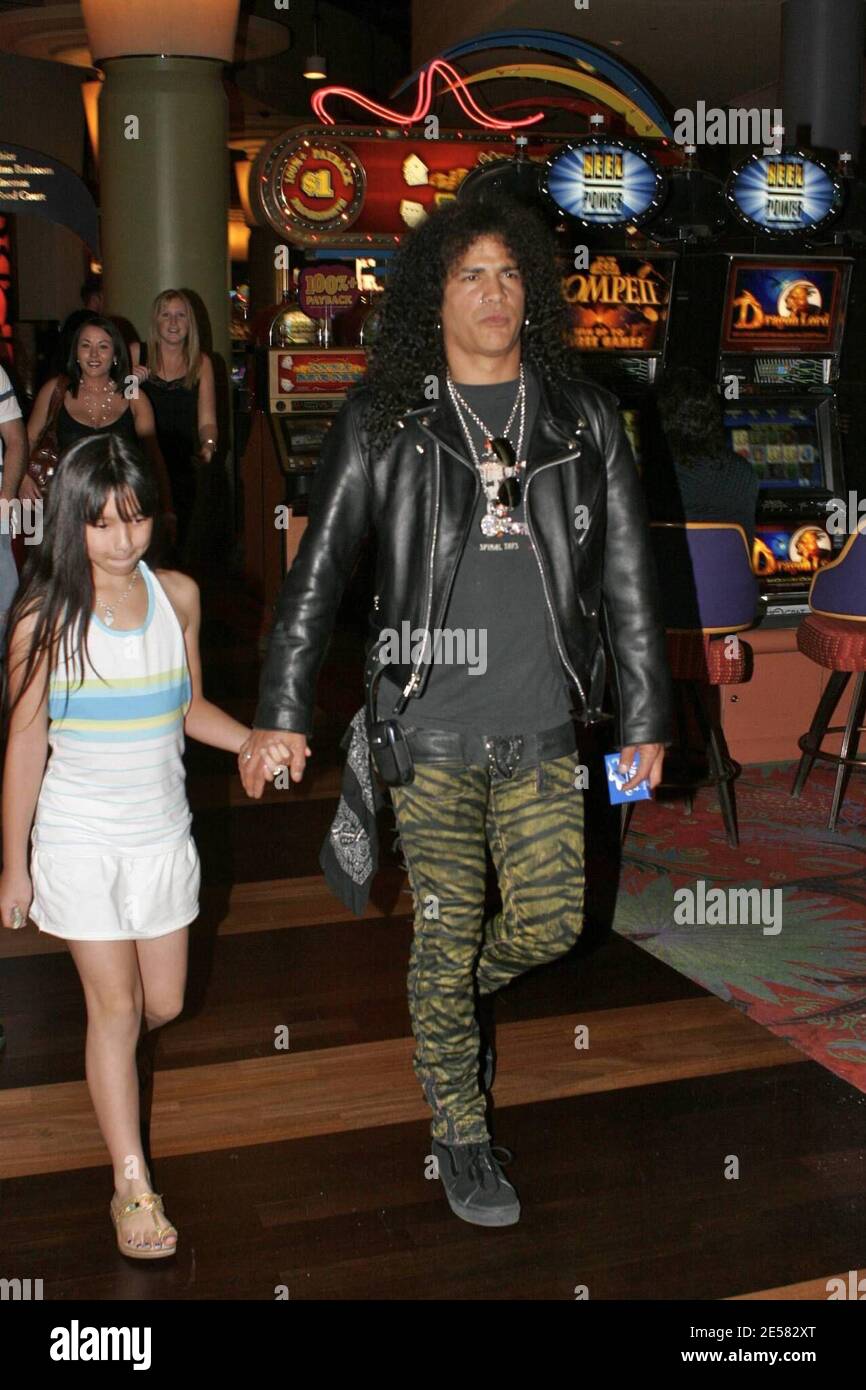 Exclusive!! Slash with daughter walking through The Palms casino after ...
