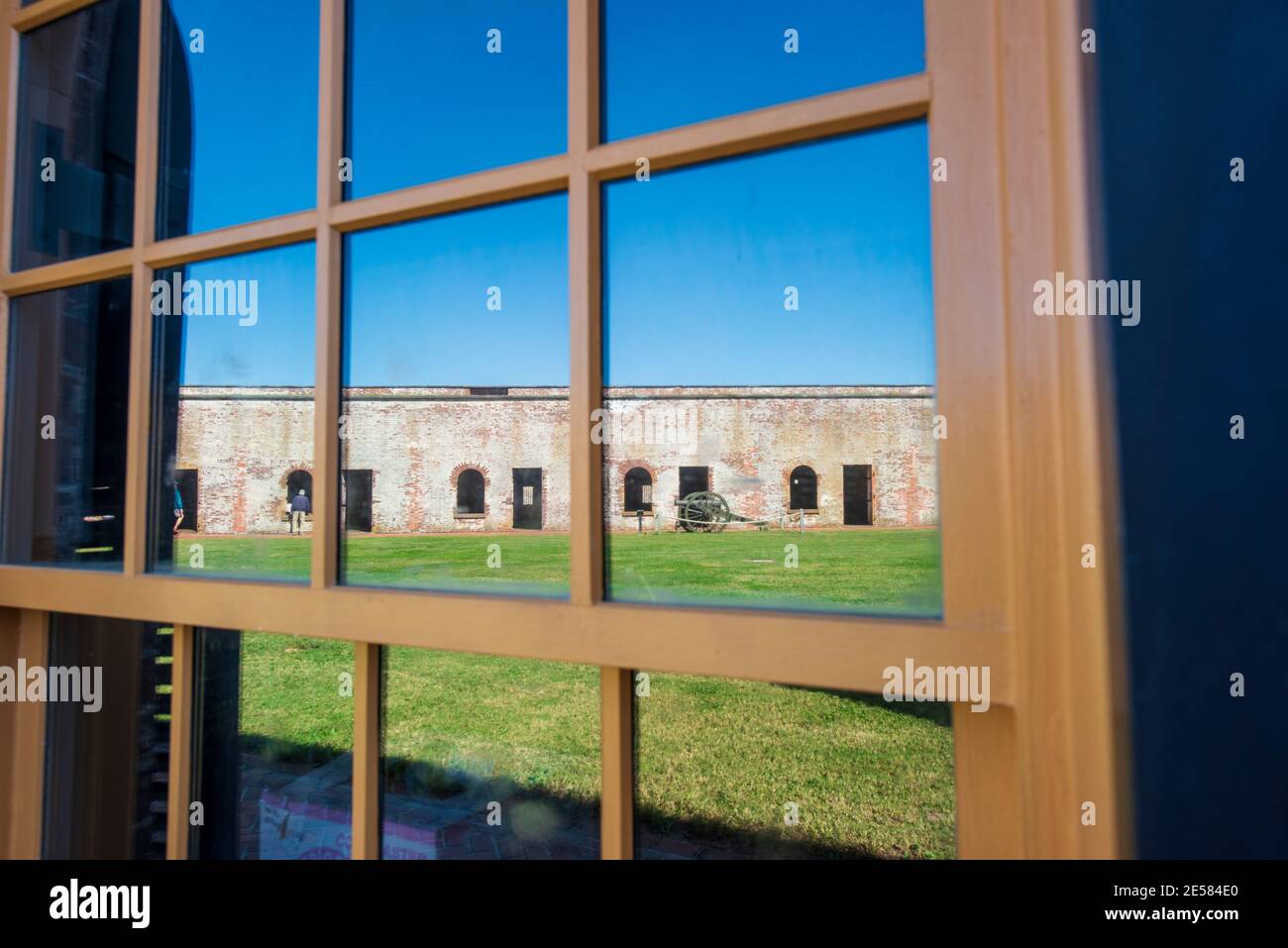 Restored windows at Fort Macon reflect the inner court known as the ...