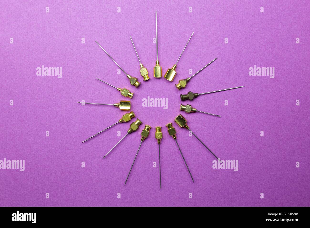 A set of antique syringe needles of different sizes and thicknesses ...