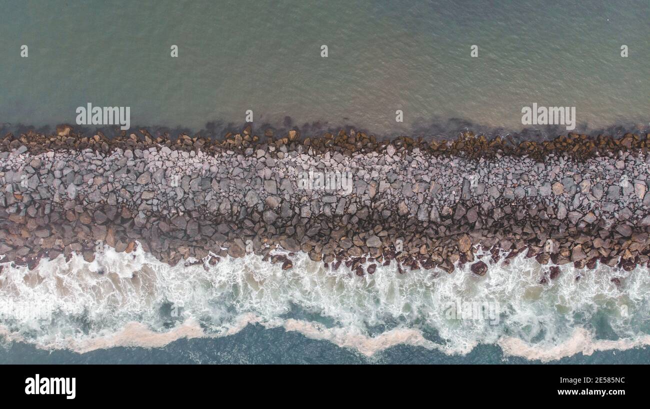 Wave breaker stone hi-res stock photography and images - Alamy