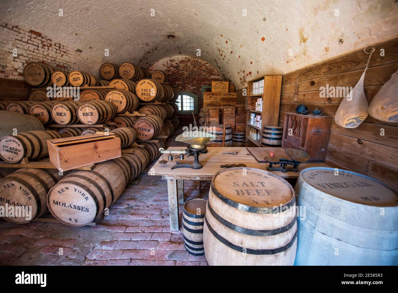 Barrels labeled "vinegar, salt beef, rice, flour, salt, molasses ...
