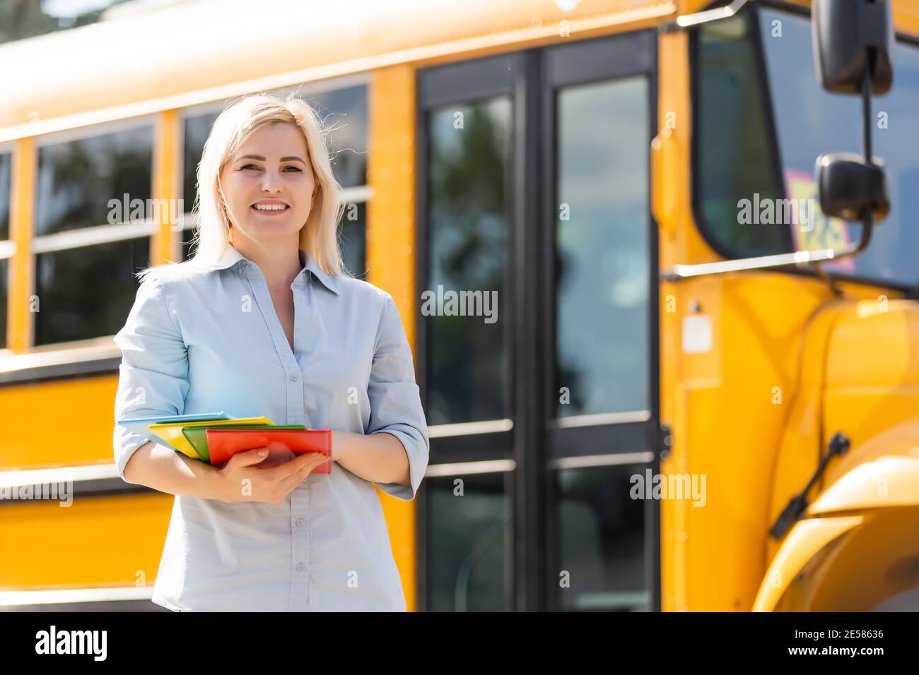 Children talking school bus hi-res stock photography and images - Alamy
