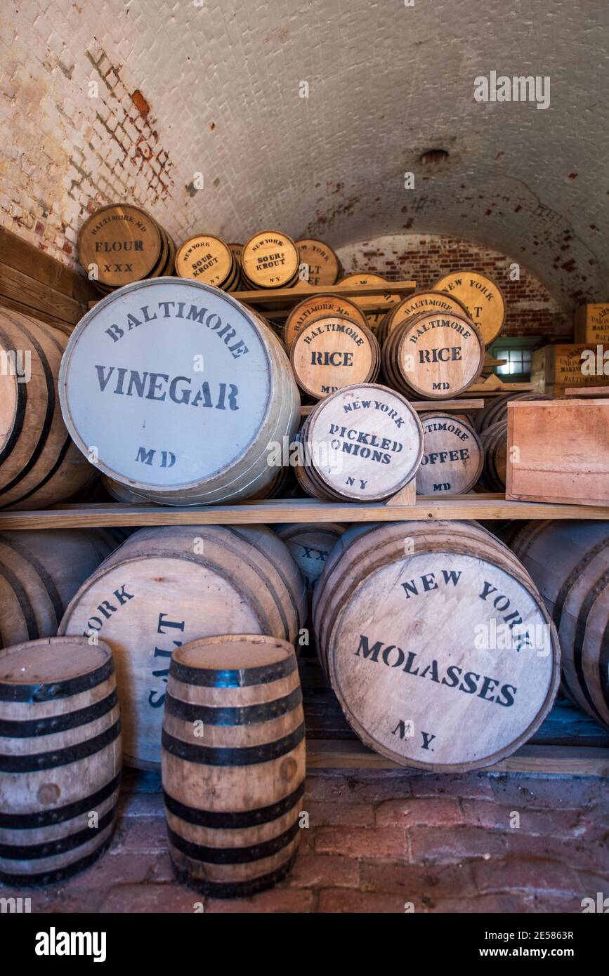 Barrels labeled "vinegar, salt beef, rice, flour, salt, molasses ...