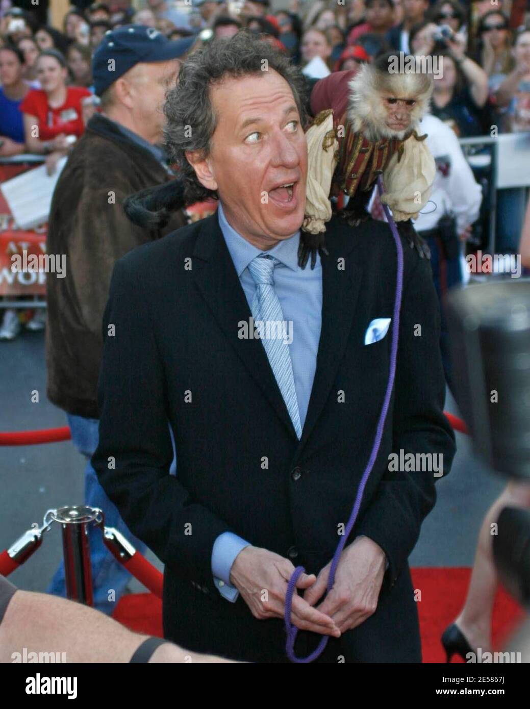 Local Caption *** Geoffrey Rush attends the prmiere of Pirates of the ...