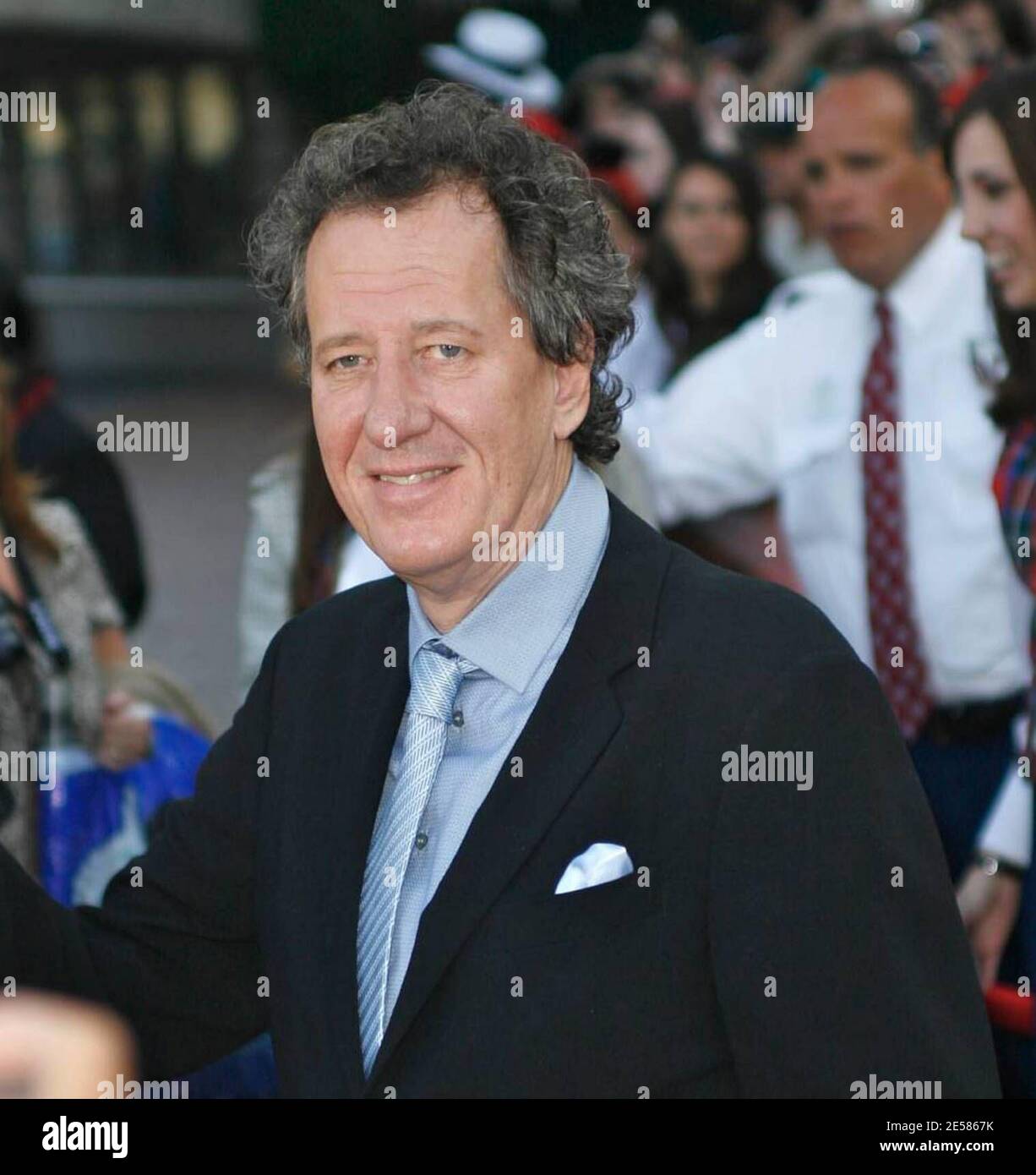 Local Caption *** Geoffrey Rush attends the prmiere of Pirates of the ...
