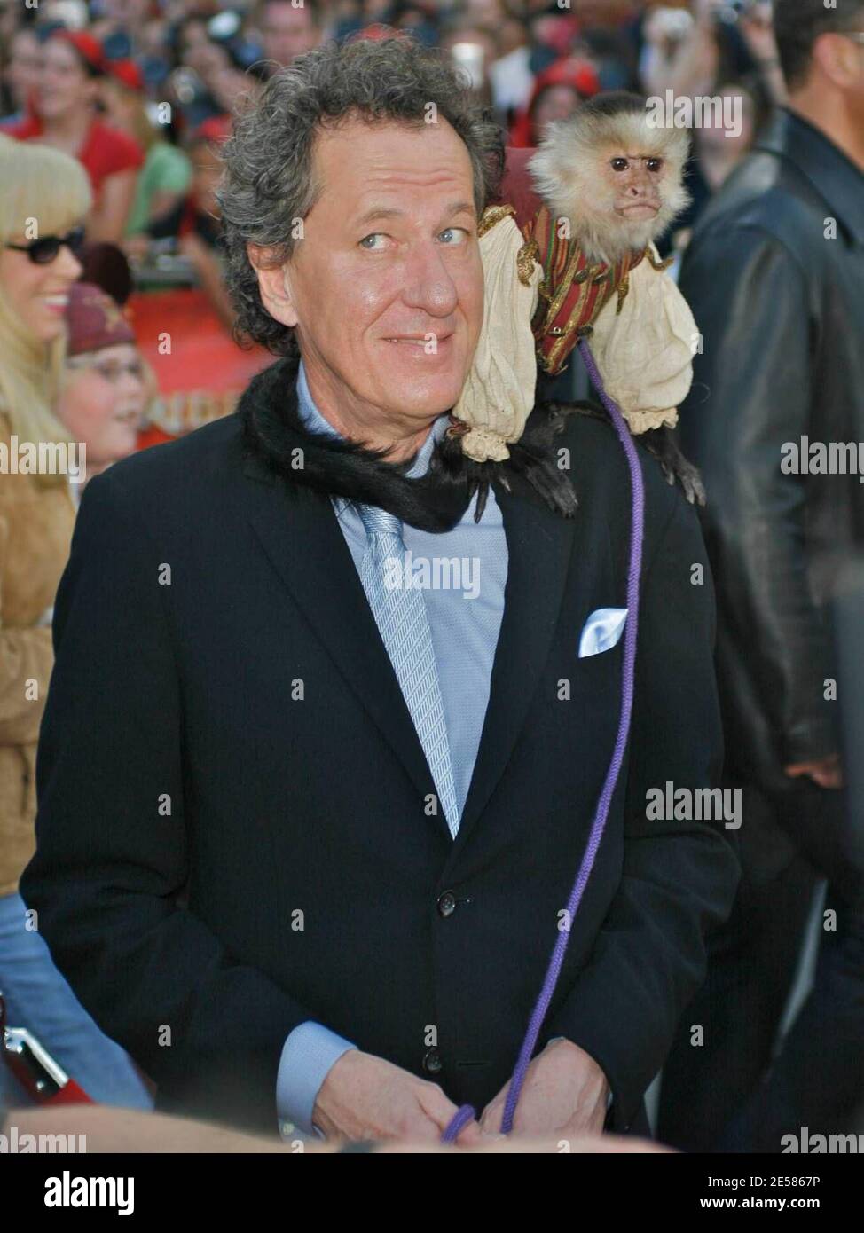 Local Caption *** Geoffrey Rush attends the prmiere of Pirates of the ...