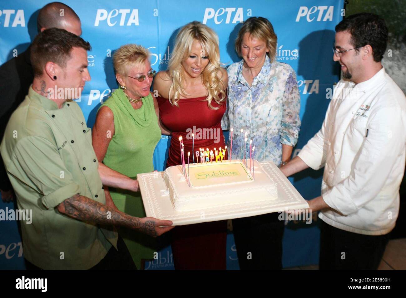 Pamela Anderson blows out the candles for her 40th with PETA president ...