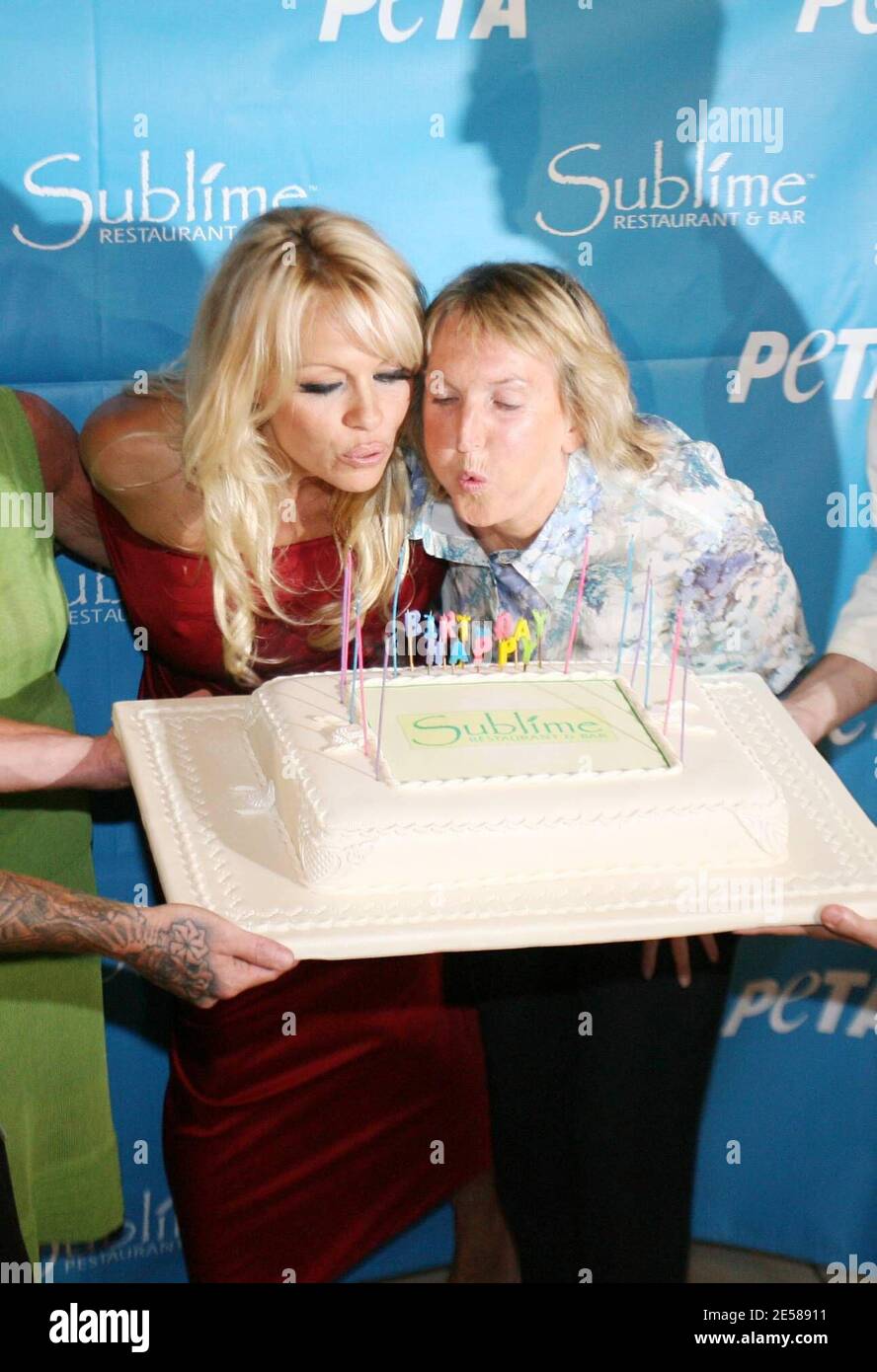 Pamela Anderson blows out the candles for her 40th with PETA president ...