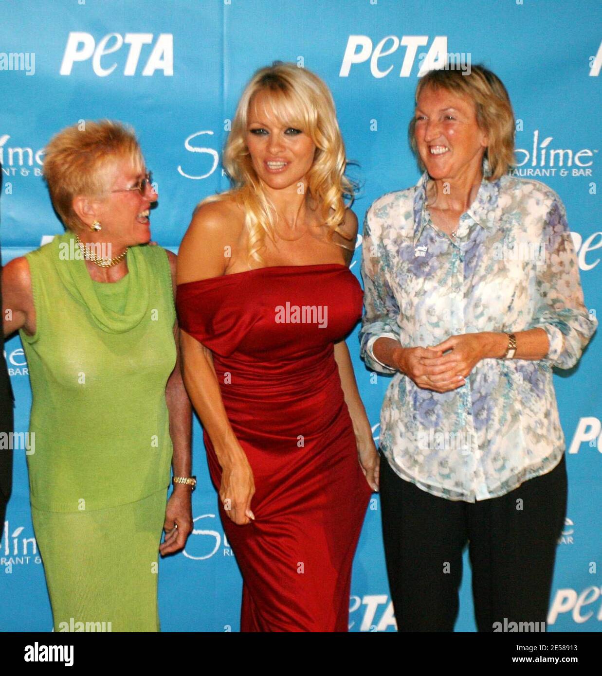 Pamela Anderson blows out the candles for her 40th with PETA president ...