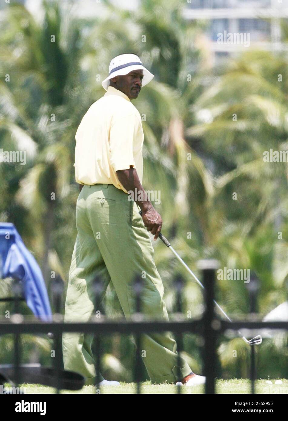 Exclusive!! NBA legend Michael Jordan takes time out to enjoy a game of ...