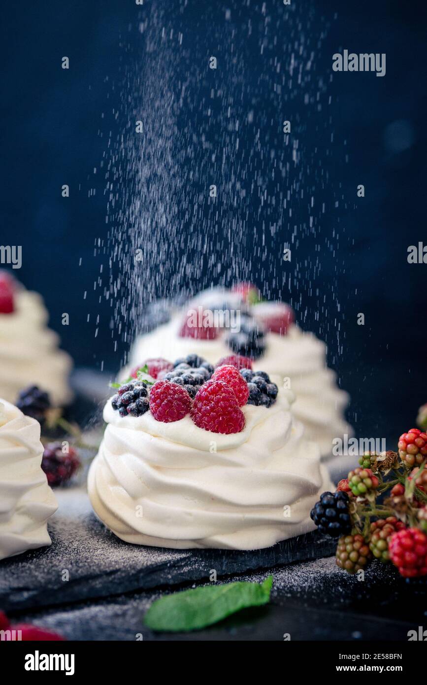Homemade meringue basis for cake Pavlova with fresh blueberries and ...