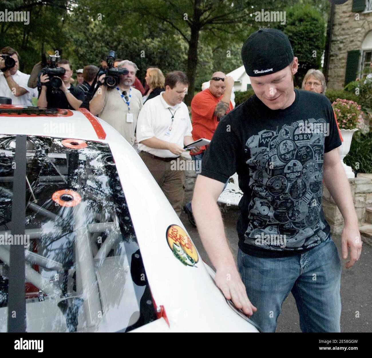 Dale Earnhardt Jr., along with his mother and grandmother, open the ...