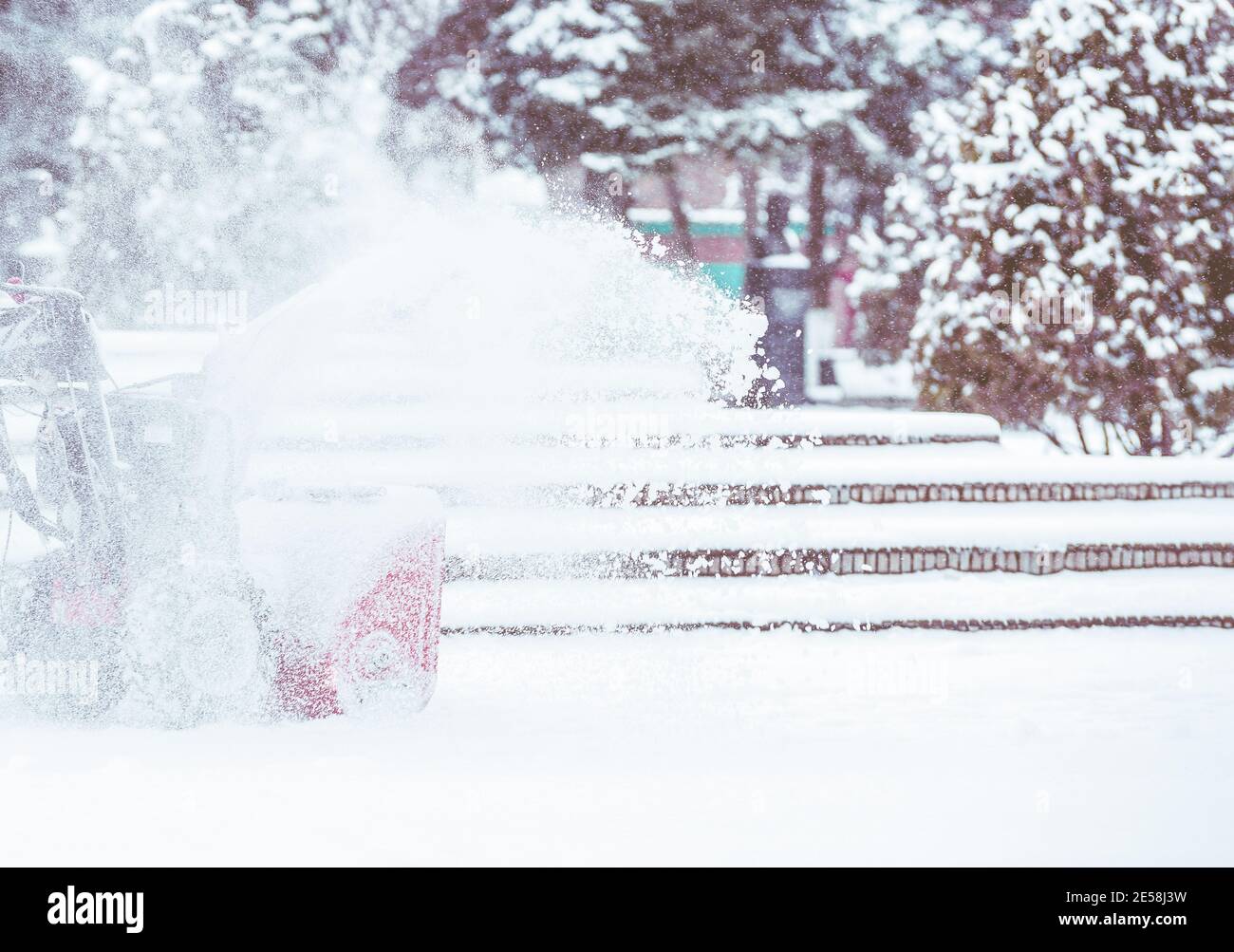 Snow-removal work with a snow blower. Man Removing Snow. heavy ...