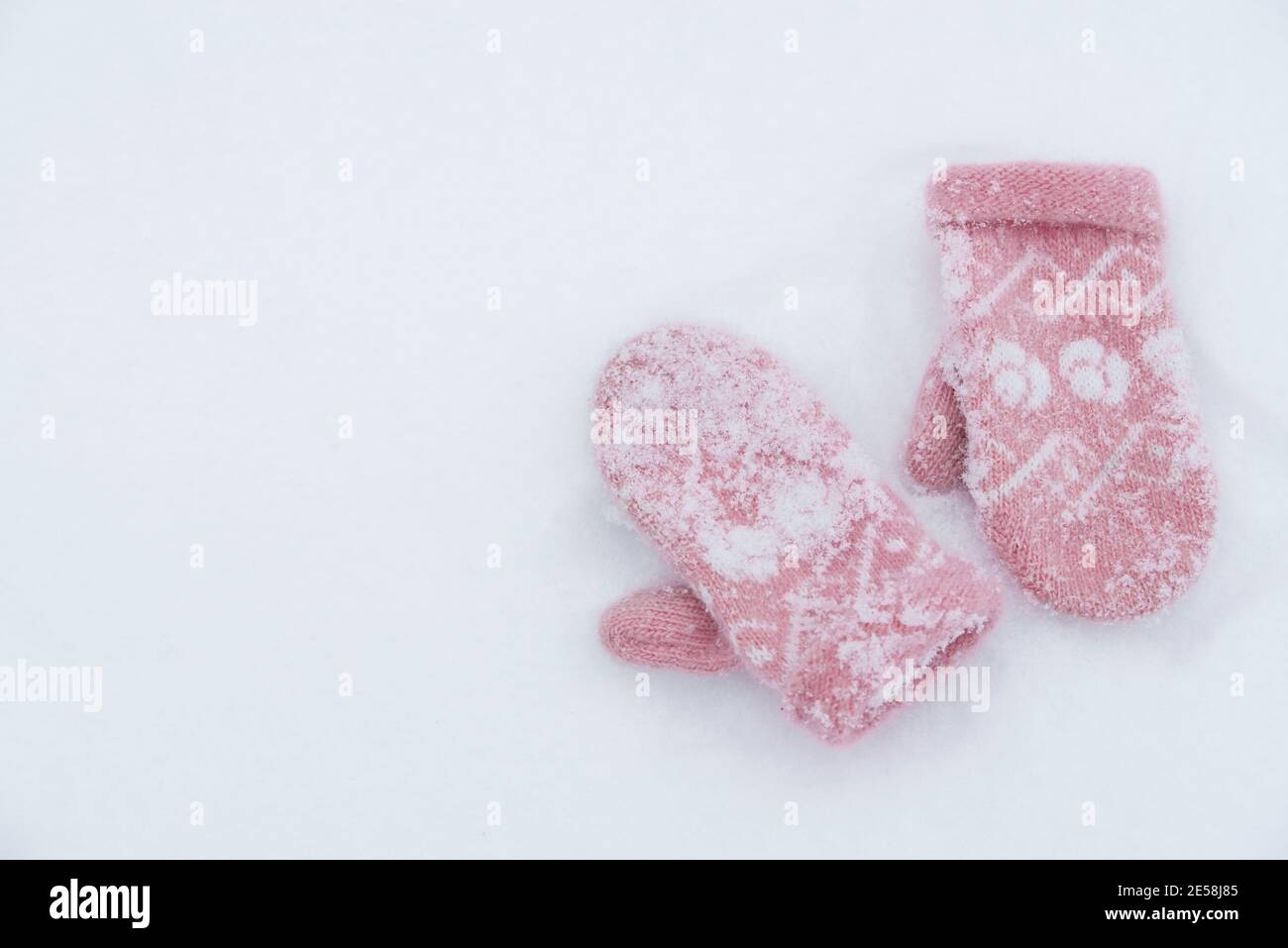 Warm pink mittens seasonal hi-res stock photography and images - Alamy