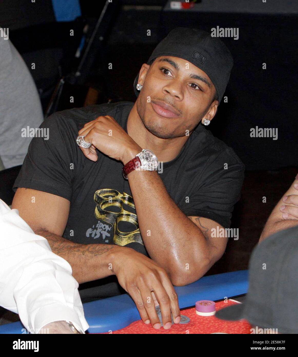 Nelly attends the Rolling Stone and the Hard Rock Celebrity Poker ...