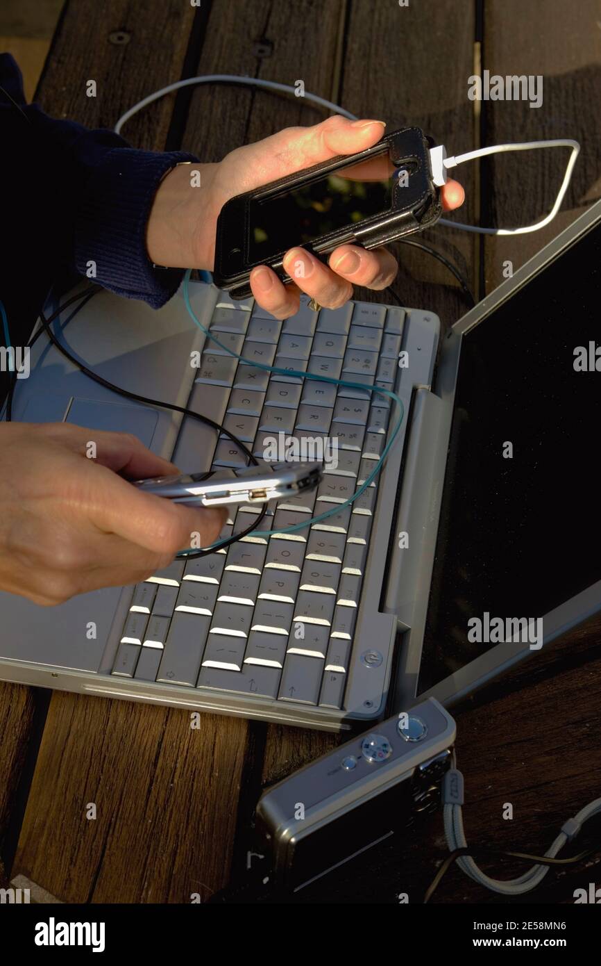 Woman wrestles with old fashioned technology Stock Photo - Alamy