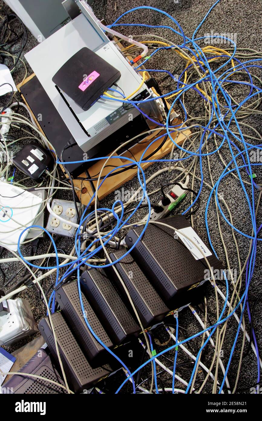A mass of IT wiring and communications Stock Photo - Alamy