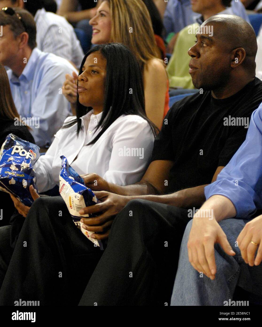 Magic Johnson is the honored guest at a charity basketball game in ...